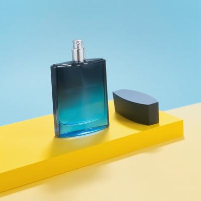 China Custom 100ml Square Glass Luxury And Elegant Empty Perfume Bottle Pump Sprayer Gradient Black And Blue Color 15mm Neck for sale