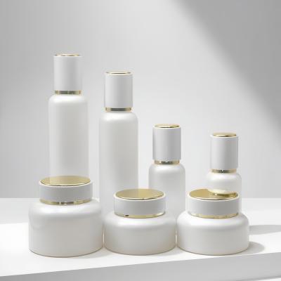 China Factory Price 50ml 100ml 120ml Glass Lotion Packaging Empty White Lotion Pump Glass Bottle Skin Care Cream Body Set for sale