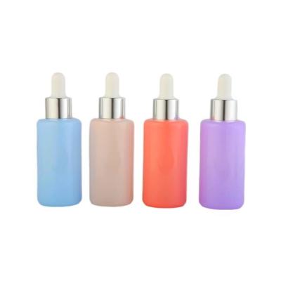 China 30ml Glass Dropper Bottles hot sell  / Glass With Bamboo Collar Essential Oil Bottles OEM for sale