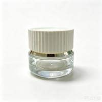 China Luxury Glass Jar 30g and 50g with Vertical Ribbed White Cap Gold Decorative Ring for Face Cream Skincare Container for sale