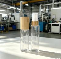 China 30ml 50ml customed Color Glass Bottle Press Pump Type Bamboo Lid  for Cosmetics for sale