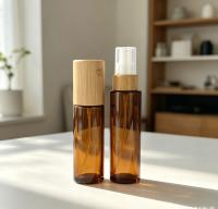 China 30ml 50ml customed Color Glass Bottle Press Pump Type Bamboo Lid  for Cosmetics for sale