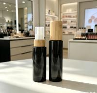 China 30ml 50ml customed Color Glass Bottle Press Pump Type Bamboo Lid  for Cosmetics for sale