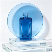 China Blue Transparent Glass Dropper Bottle, Thick Base Square Cosmetic Serum Oil Packaging Bottle with White Rubber Dropper for sale
