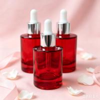 China Red Transparent Glass Dropper Bottle, Thick Base Cosmetic Serum Oil Packaging Bottle with White Rubber Dropper for sale
