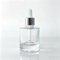 China Red Transparent Glass Dropper Bottle, Thick Base Cosmetic Serum Oil Packaging Bottle with White Rubber Dropper for sale