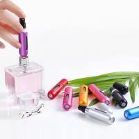 China 5ml Travel Pocket Parfum Bottle Mini Bottom Refillable 10ml Portable Aluminum Perfume Bottle for sale