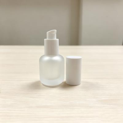 China Eco Friendly Lotion Bottles Glass Cylindrical Thick-walled Shape 30ml Liquid Foundation Cosmetic Glass Bottle for sale