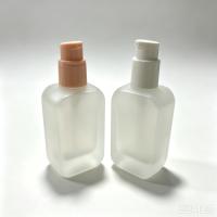 China Rectangle Glass Emulsion Pump Spray Bottle with Screen Printing 100 mL Capacity for Skin Care and Cosmetics for sale