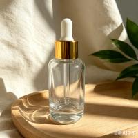 China 50ml Clear Thick Base Glass Dropper Bottle, Gold Aluminum Collar&White Rubber Nipple for Serum Essential Oil Cosmetic Packaging for sale