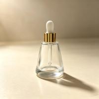 China 30/50ml Conical Clear Glass Dropper Bottle Screw Cap Dropper Bottles Empty Serum Essential Oil Cosmetic Essence Packaging for sale