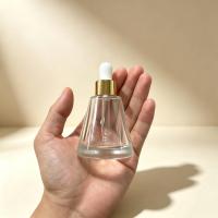 China 30/50ml Conical Clear Glass Dropper Bottle Screw Cap Dropper Bottles Empty Serum Essential Oil Cosmetic Essence Packaging for sale