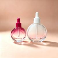 China Luxury Flat Round Glass Bottle 30ml 60ml Dropper/pump Lotion Bottle Cosmetic Packaging Wholesale From Source Factory for sale