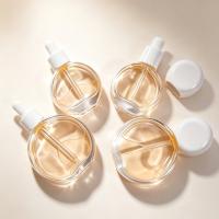 China Luxury Flat Round Glass Bottle 30ml 60ml Dropper/pump Lotion Bottle Cosmetic Packaging Wholesale From Source Factory for sale