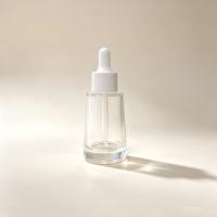 China Manufacturer High End Conical Thick Bottom Glass Dropper Bottle 30ml Serum Essence Oil Container Custom Logo Cosmetic Bottle for sale