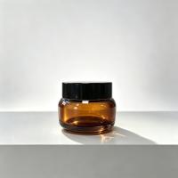 China 15ml 30ml 50ml Round Glass Cosmetic Cream Jar Empty Face Cream Pot Custom Color Logo Factory Wholesale for Skincare Packaging for sale