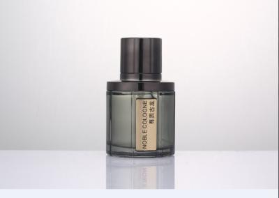 China 50ml Art Deco Round Glass Perfume Bottles With Cap Skincare And Makeup Packaging OEM for sale