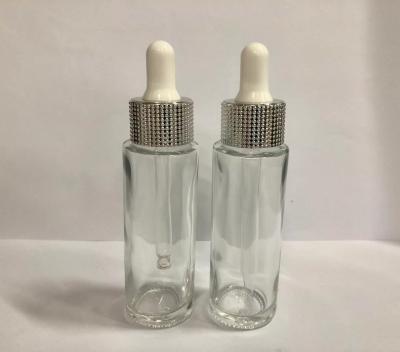 China 30ml Glass Cosmetic Dropper Bottles, Essential Oil Bottles With Plastic Collar OEM for sale