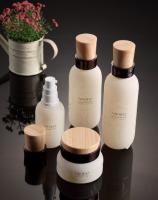 China 100ml  Round Glass Cosmetic Lotion Bottles Skin Care Packaging Good Sealing Performance for sale