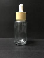 China Transparent 30ml Essential Oil Bottles Glass Dropper Bottle With Plastic Cap Skincare Packaging for sale