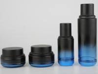 China Cosmetic Packaging Glass Lotion Bottle Cream Jar Skin Care Containers With Black Cap for sale