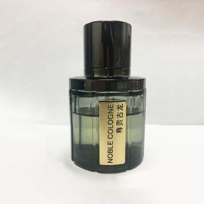China Double Plastic Lid 50ml Glass Spray Perfume Bottles With Metal Decoration for sale