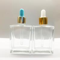 China Personal Care 50ml Glass Dropper Bottles Flat Square With Colorful Gum for sale