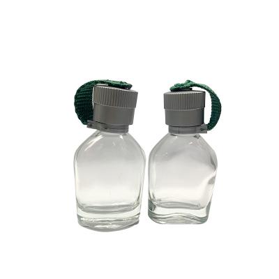 China Glass OEM 25ML Small Perfume Bottles Travel Kettle Design Cap for sale