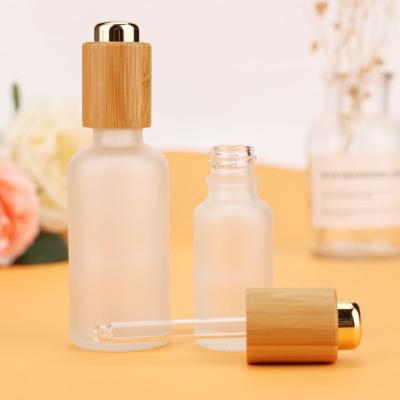 China Round 1 Oz 2 Oz 4 Oz  Bamboo Cosmetic Packaging press dropper bottles for sale