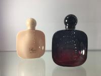 China OEM 50ml Glass Luxury Perfume Bottles Flat Shape With Ball Cap for sale