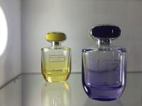 China Oval Cap 110ml Glass Perfume Spray Bottles Custom Lacquering Color for sale