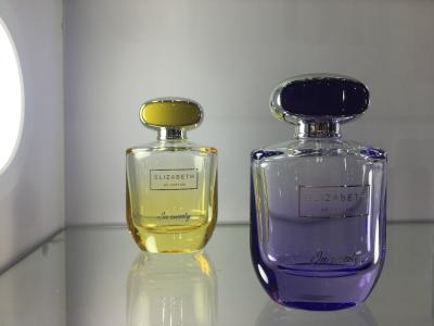 China Oval Cap 110ml Glass Perfume Spray Bottles Custom Lacquering Color for sale