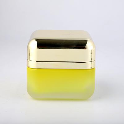 China Yellow Matte 50g Frosted Glass Jar Personal Care Empty Container for sale