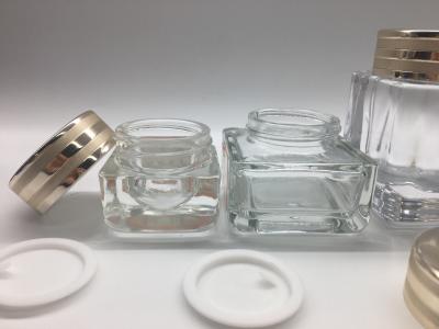 China Luxury Classical Small Square Glass Jars Electroplate Printing With Metallic Cap for sale