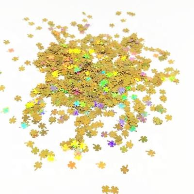 China Other Holiday Supplies Spring Glitter Clover Shaped Earrings Polyester Silk Material Artificial Style PET Box Packaging for sale