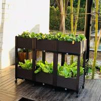 China Insect Proof Plastic Raised Planting Beds on Wheels 4 Tier Modular Herb Planter Box for sale
