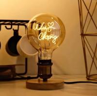 China LED Filament Bulb Happy Family Letter Bulb 0.2kg Unique Spiral LED Decorative Light for sale