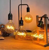 China LED Filament Bulb Happy Family Letter Bulb 0.2kg Unique Spiral LED Decorative Light for sale