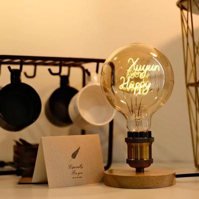 China LED Filament Bulb Base 4W Glass Clear Amber G80/95 Series Dimmable Hello Love Letter for sale