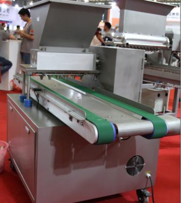 China ZDS150 Servo Motor Cake Depositor Machine 300-600 Trays/Hour with Siemens PLC and 6 Nozzles for sale