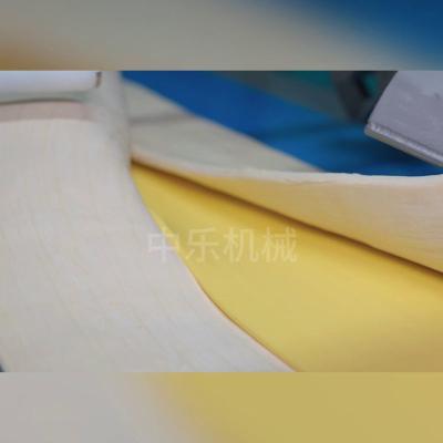 China Automated Round Raisin Swirl Bread Production Line: Lamination, Servo Cutting & Precision Tray Panning for sale