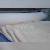 China Automated Round Raisin Swirl Bread Production Line: Lamination, Servo Cutting & Precision Tray Panning for sale