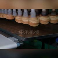 China Automated Round Raisin Swirl Bread Production Line: Lamination, Servo Cutting & Precision Tray Panning for sale