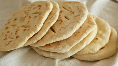 China Automatic Pita Production Line with 300-1200 kg/hr Capacity and 600-1200 mm Belt Width for Industrial Bread Manufacturing for sale