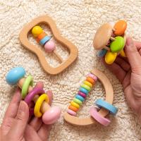 China Rattle Soother 11.6cm Wooden Teething Toy Wooden Rattle Teether Food Grade for sale