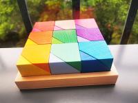 China 2300g 4cm Rainbow Wooden Flower Puzzle Wooden Stone Stacking Game for sale