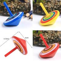 China Kids Rainbow Wooden Gyro Toy Wheel For Stress Relieving for sale