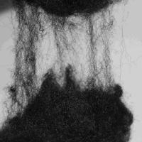 China Recycled PET Solid 4080 Polyester Staple Fiber 15D Black 64mm Cut Length GRS Certified for sale