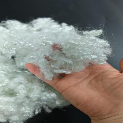 China Recycled HCS Fibre 7D*64mm Siliconized Polyester Staple Fiber - GRS Certified Hollow Conjugated PET Material for sale