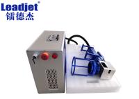 China Mini Handheld Portable Fiber Laser Batch Coding Machine Compact Design For Rubber Pipe for sale